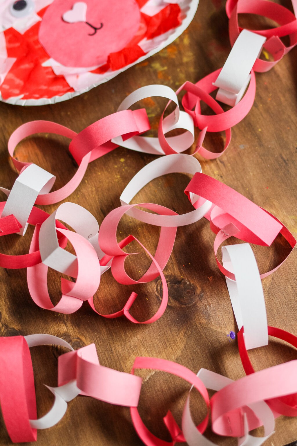 Easy Valentine's Day Paper Heart Chain Craft for Kids | Lilies and Loafers